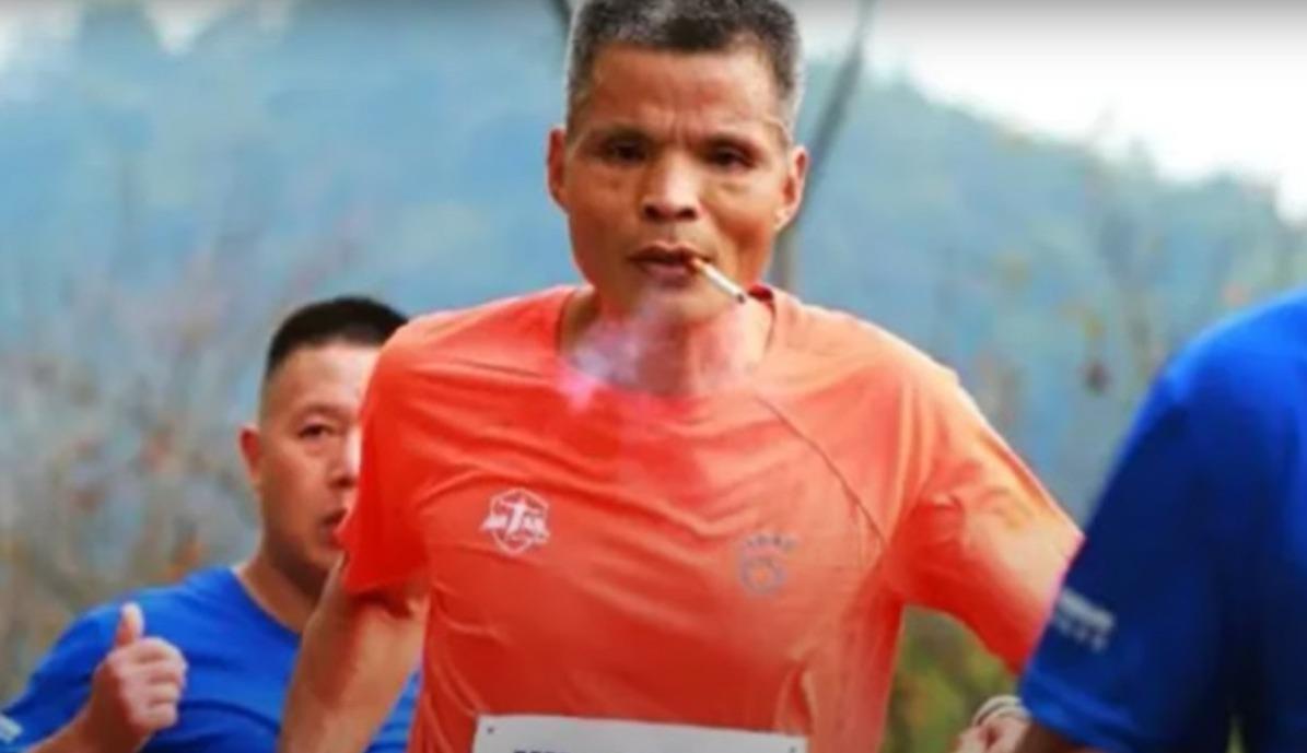 Chinese runner finishes 42 km marathon while smoking cigarettes, earns ...