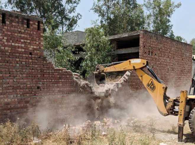 Unauthorised colony razed in Basant Nagar - The Tribune